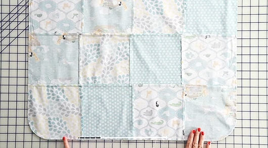 Stitch around the Receiving Blanket 1/8″ from the edge. Use matching ...