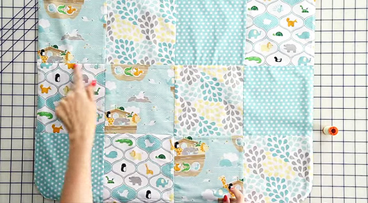 Stitch around the Receiving Blanket 1/8″ from the edge. Use matching ...