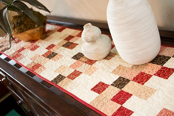 Mini Charm Mix table runner in the Petite Prints collection.
