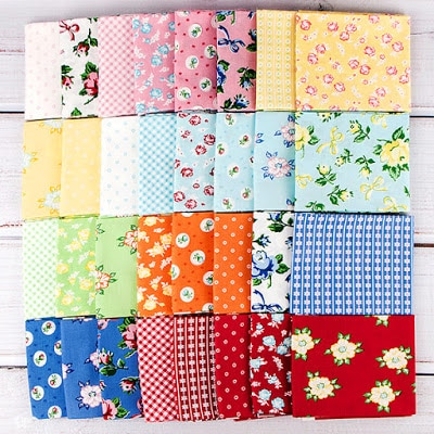 The fabric used in the quilt is the upcoming First Blush collection by ...