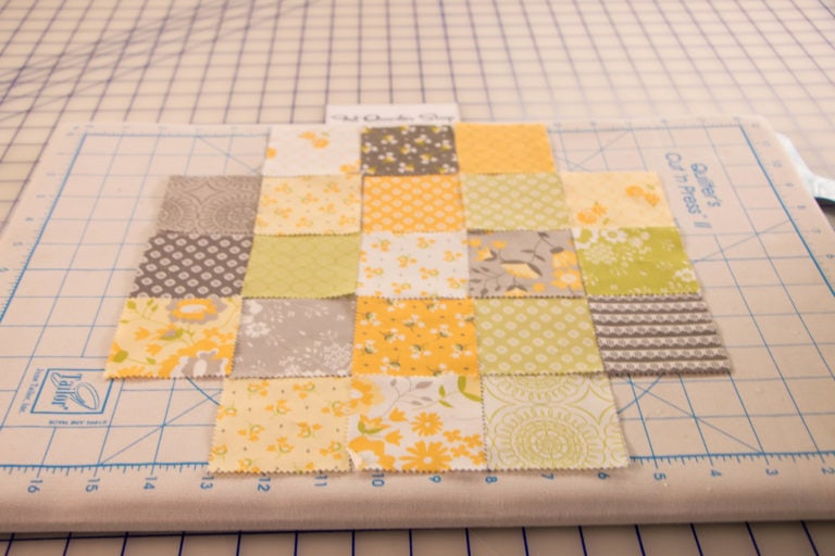 3) Using your iron, press the Mini Charm Pack pieces so that they ...