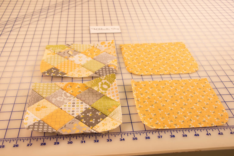 12) Using the ByAnnie Zipper , cut off then end and place one tab over ...