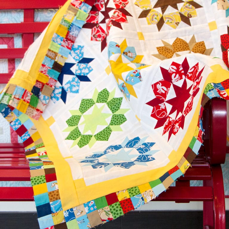 Terri made an adorable lap quilt, embellished with a scrappy border!