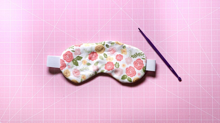 Turn the sleep mask right side out using the point turner