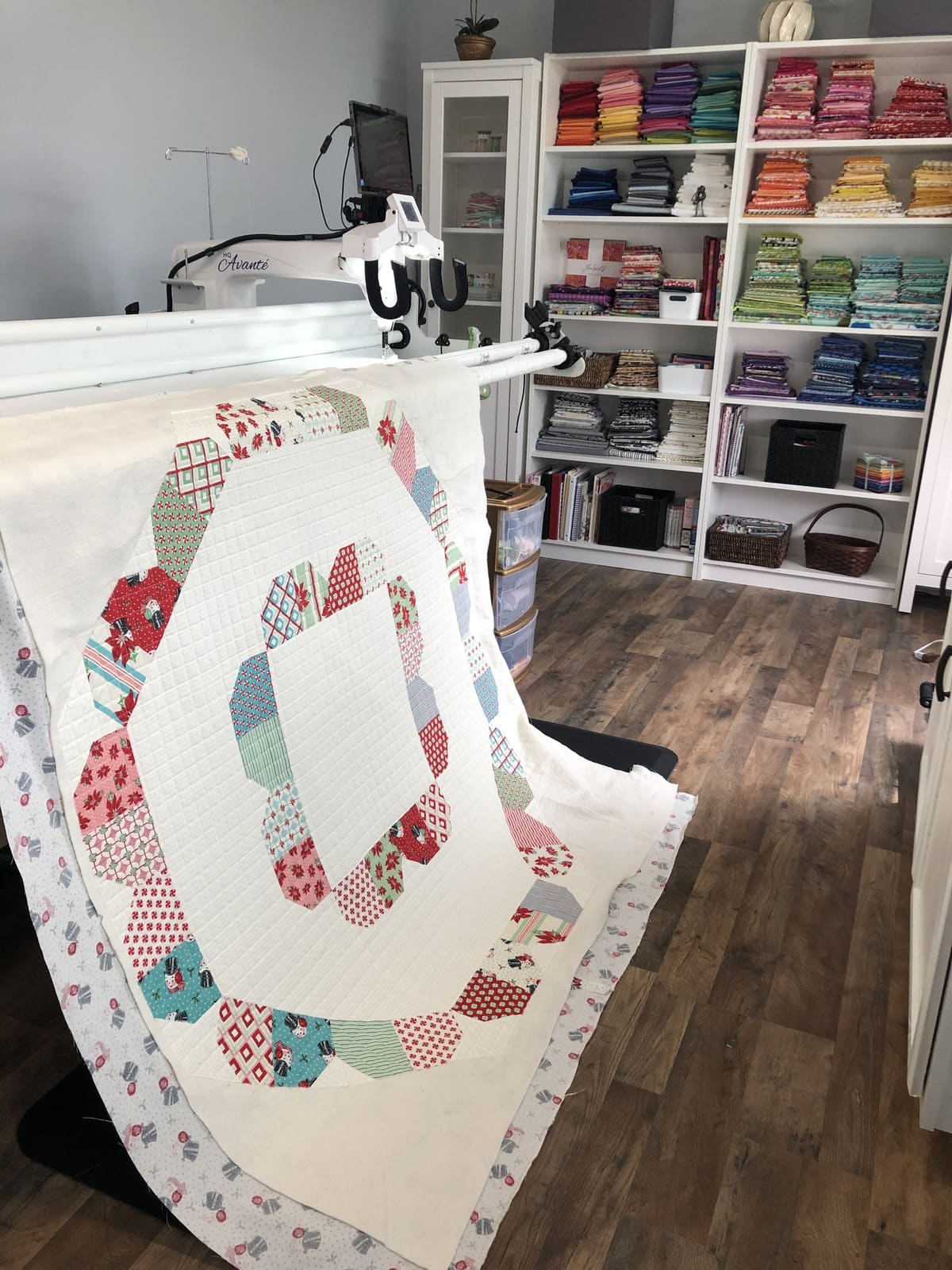 Longarm machine loaded with a Charm Pack Tree Skirt . Photo courtesy of ...