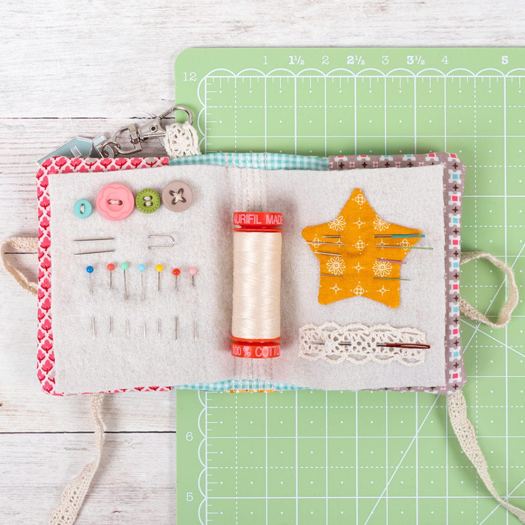 Lori stitched a spine into her book to allow room for her spool! This ...