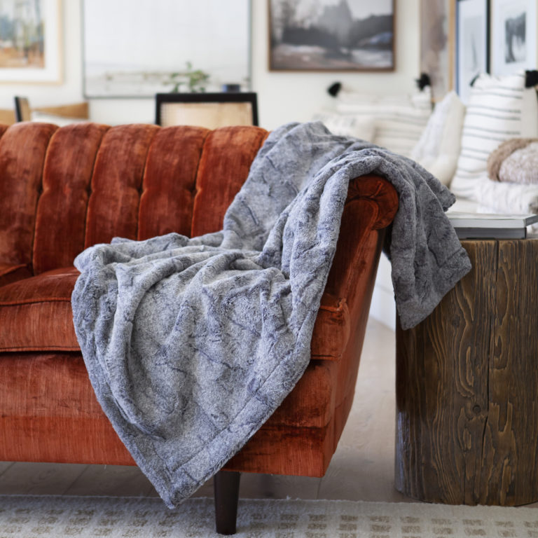 A simple, yet luxurious, throw isn’t just for snuggling up and watching ...