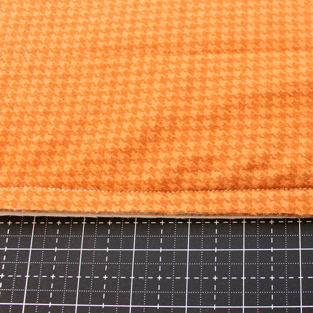 For this next step, you’ll place two of your quilt sandwiches together ...