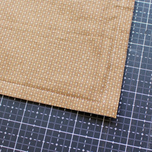 To finish, use a half-inch seam allowance and top stitch around all of ...