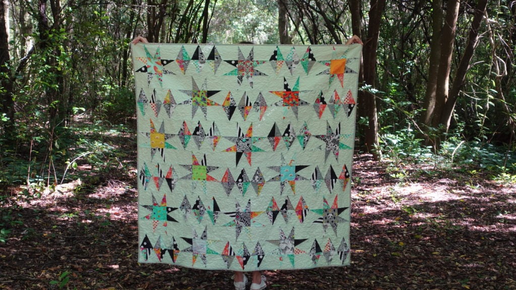 Pingback: How to make the Black Diamond Quilt by Fat Quarter Shop with ...