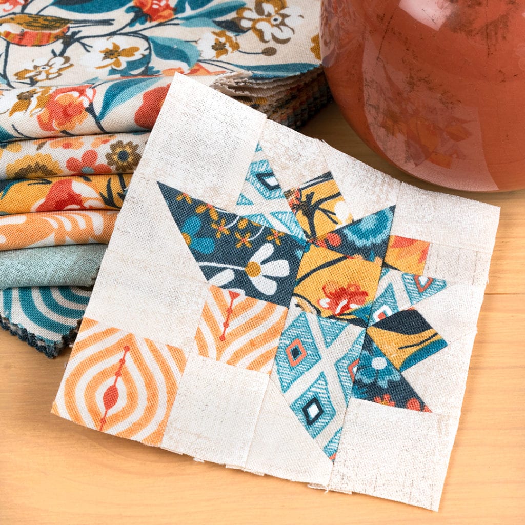 Susan is sewing her quilt with scraps and fabrics from her stash. Visit ...