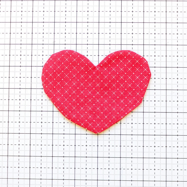 Flip the heart inside out. Press out the seams from the inside with a ...