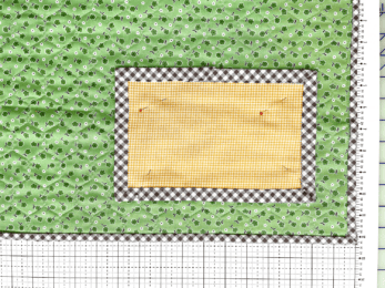 I used a walking foot and a 2.2 stitch length for this part of construction to handle the thick ...