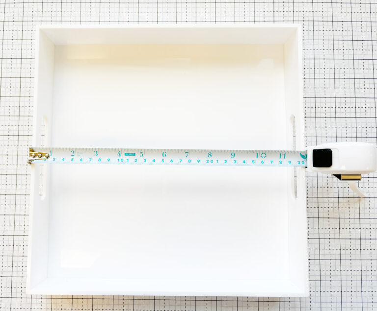 2. Using your previous measurement of your tray bottom, cut the self ...