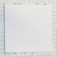 4. Next, fold the edges of your quilt block over to the back. Press ...
