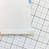 5. Slide the quilt block with the mounting board into the acrylic tray ...