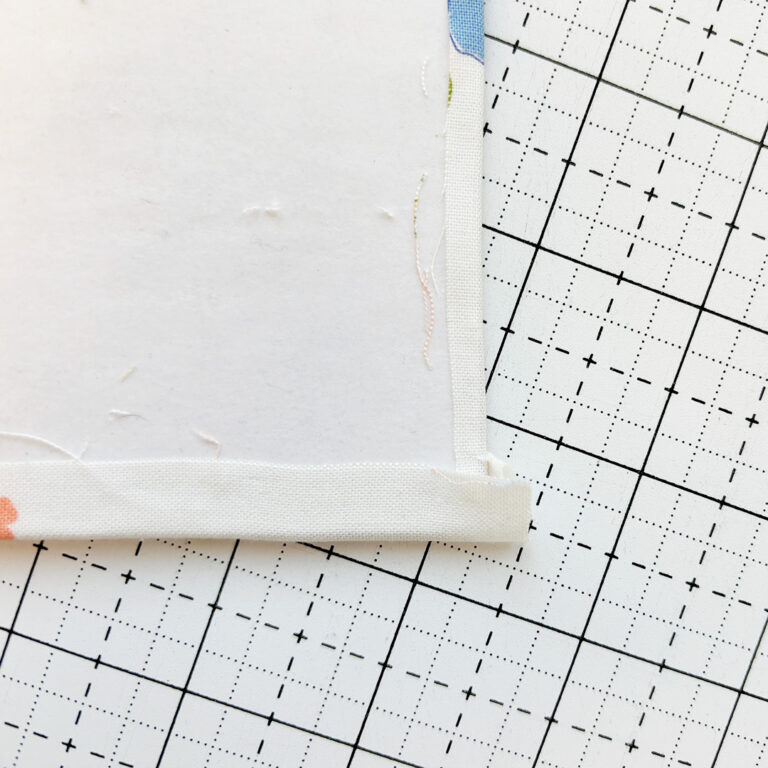 5. Slide the quilt block with the mounting board into the acrylic tray ...