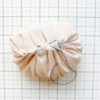 7. Once you’re satisfied, stitch the opening closed in several directions and knot the thread to ...