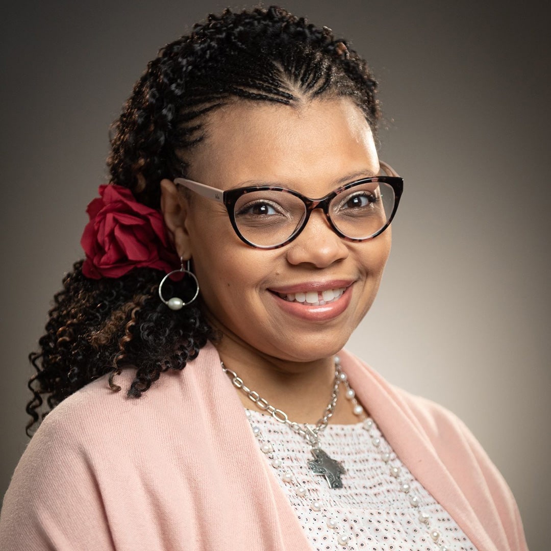 Jeresther Page, a mother and principal with a Master’s