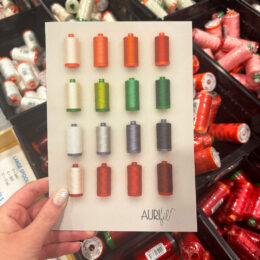 Aurifil’s booth was a dazzling display of all their amazing thread, and ...