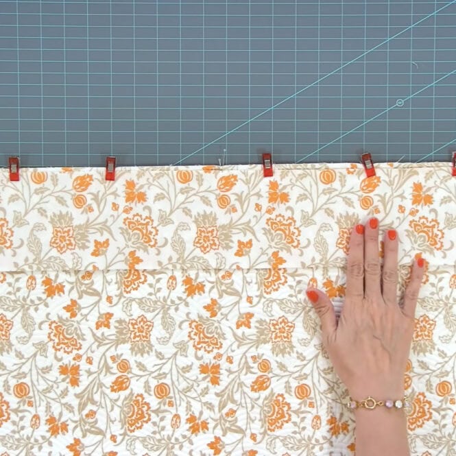 4. Next, bind your quilt as usual, making sure that the edge of the ...